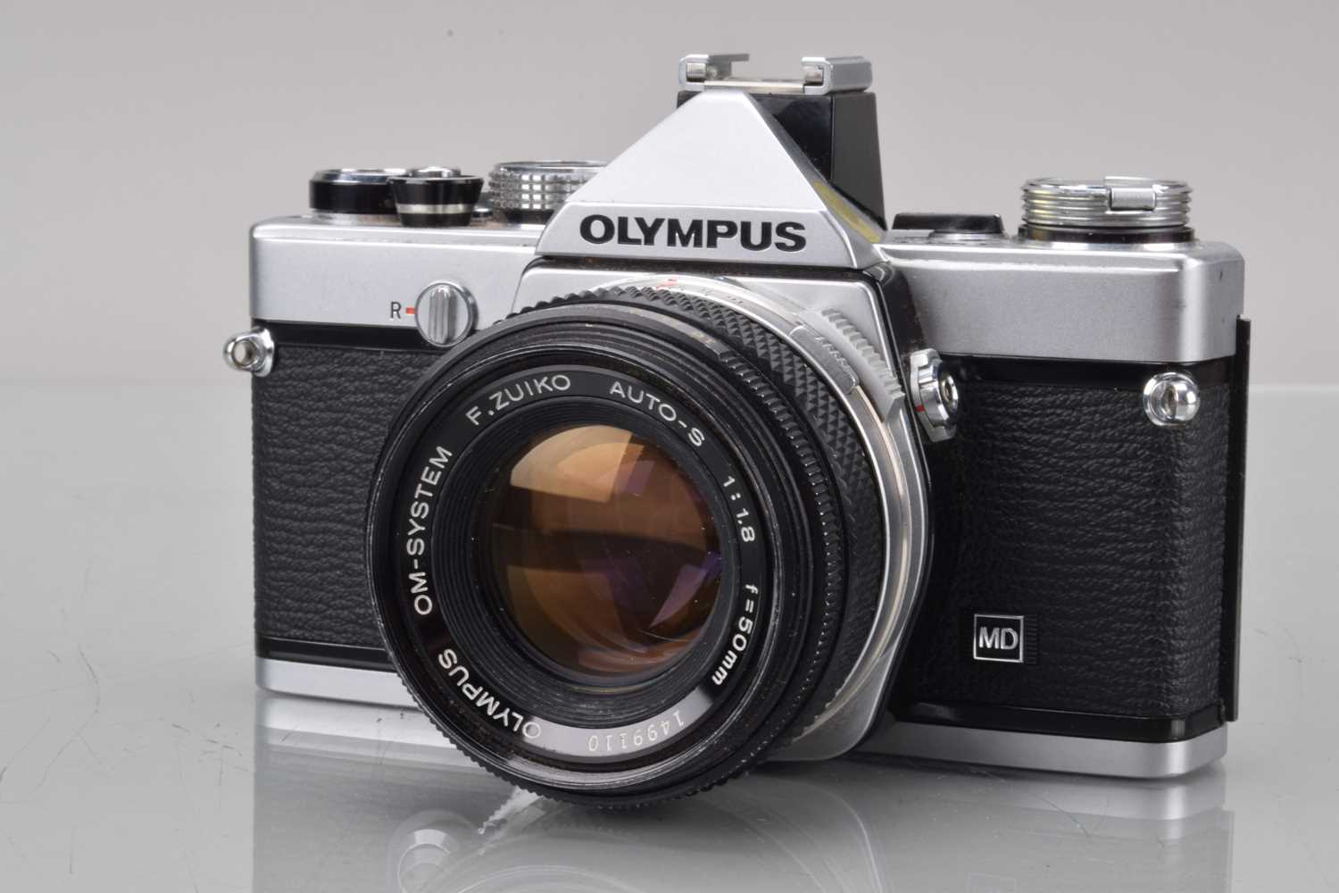 Lot 187 - An Olympus OM-1n SLR Camera,