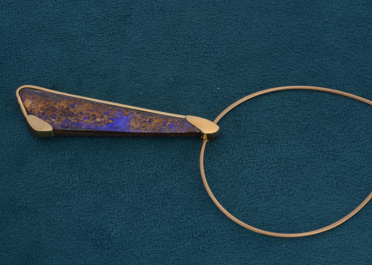 Lot 183 - An 18ct gold bolder opal pendant and chain,