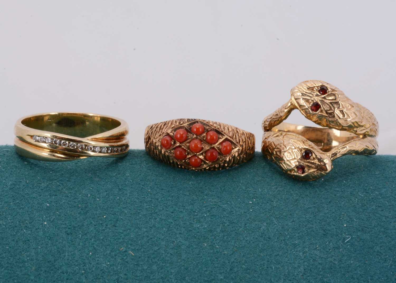 Lot 213 - Three 9ct gold rings,