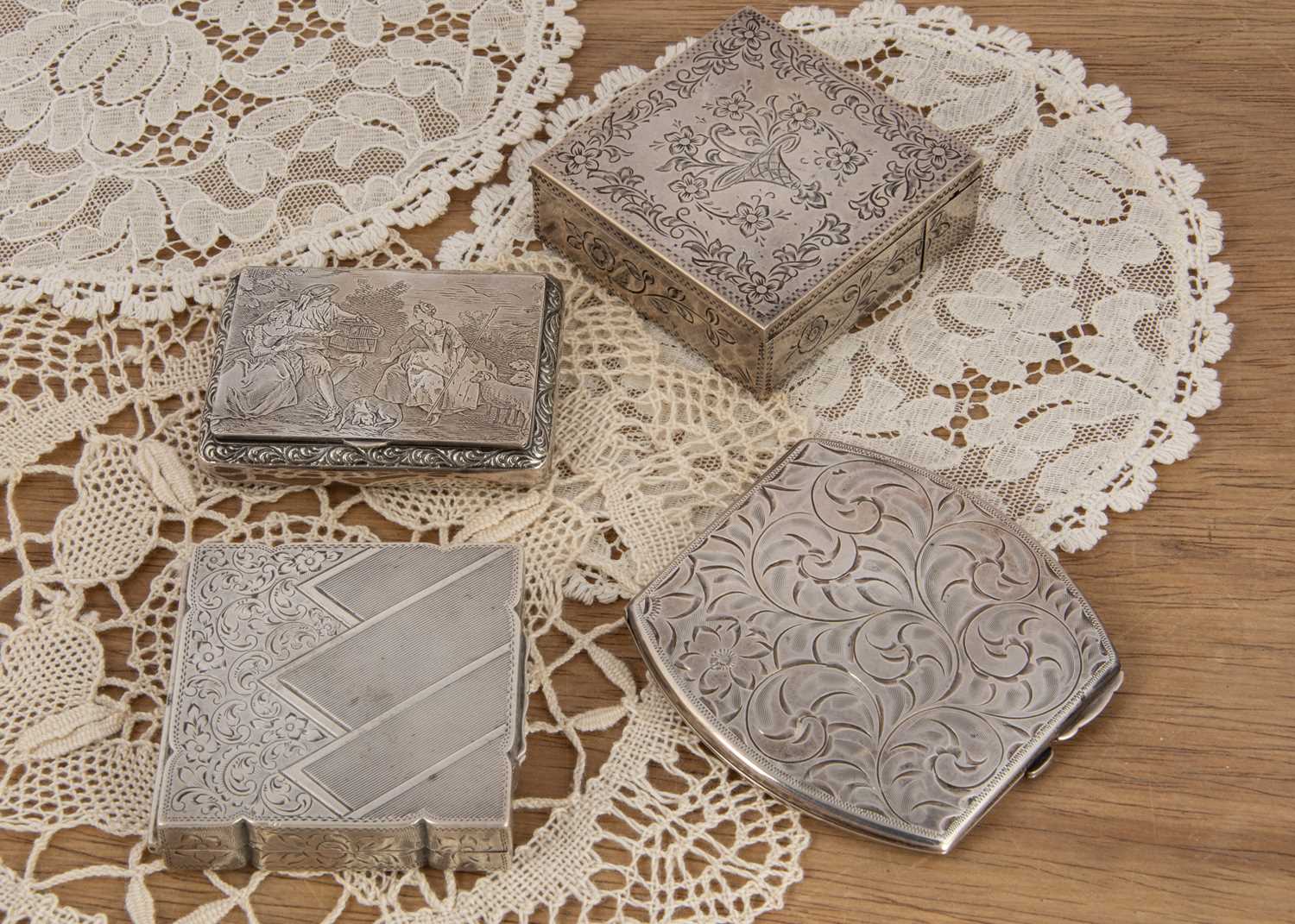 Lot 245 - Five continental silver compacts,