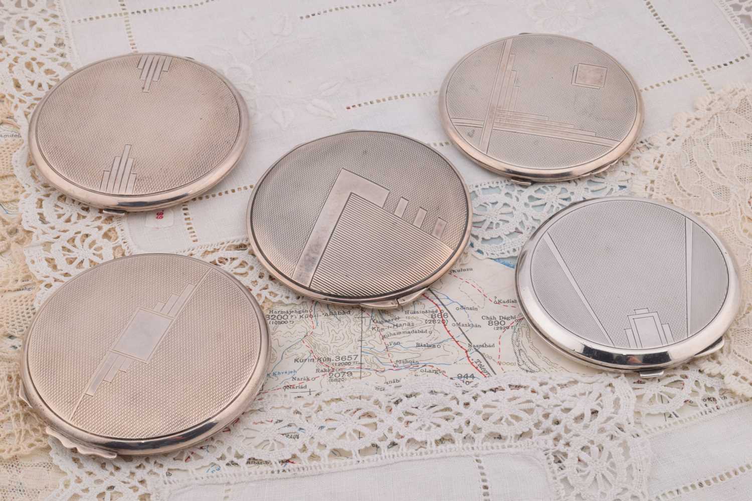 Lot 250 - Five circular silver engine turned Art Deco