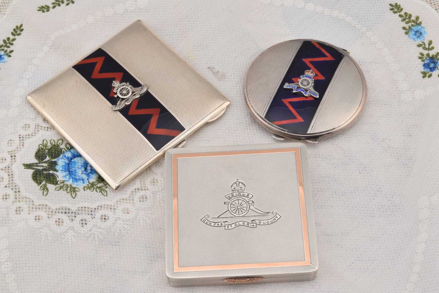 Lot 267 - Three silver Royal Artillery compacts,