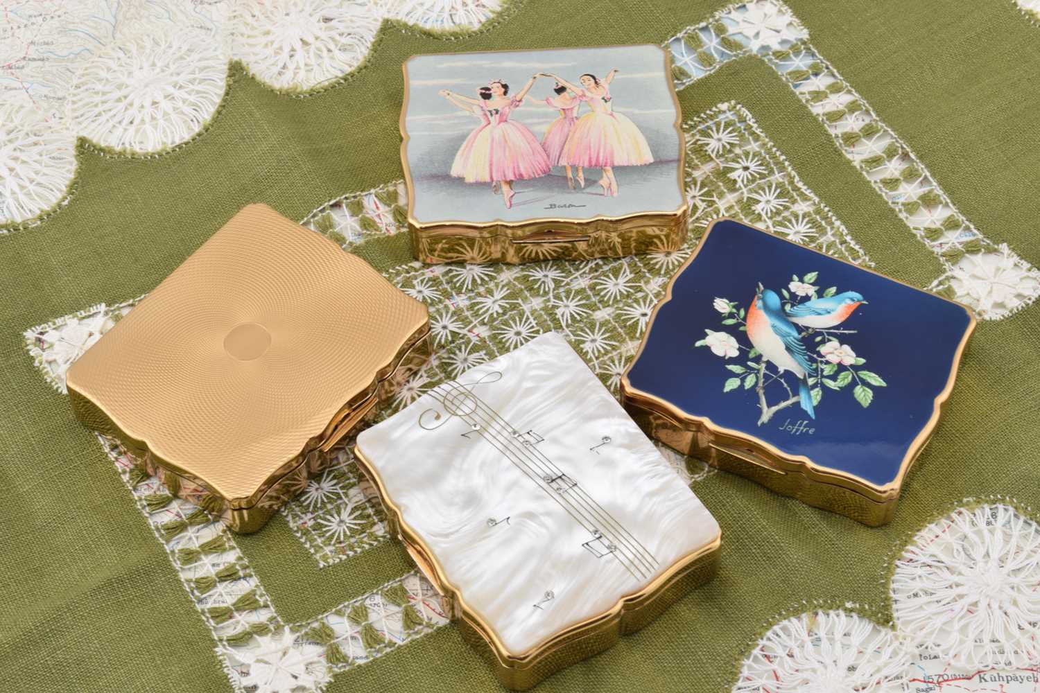 Lot 317 - Four 1960s Stratton 'Musica' compacts,