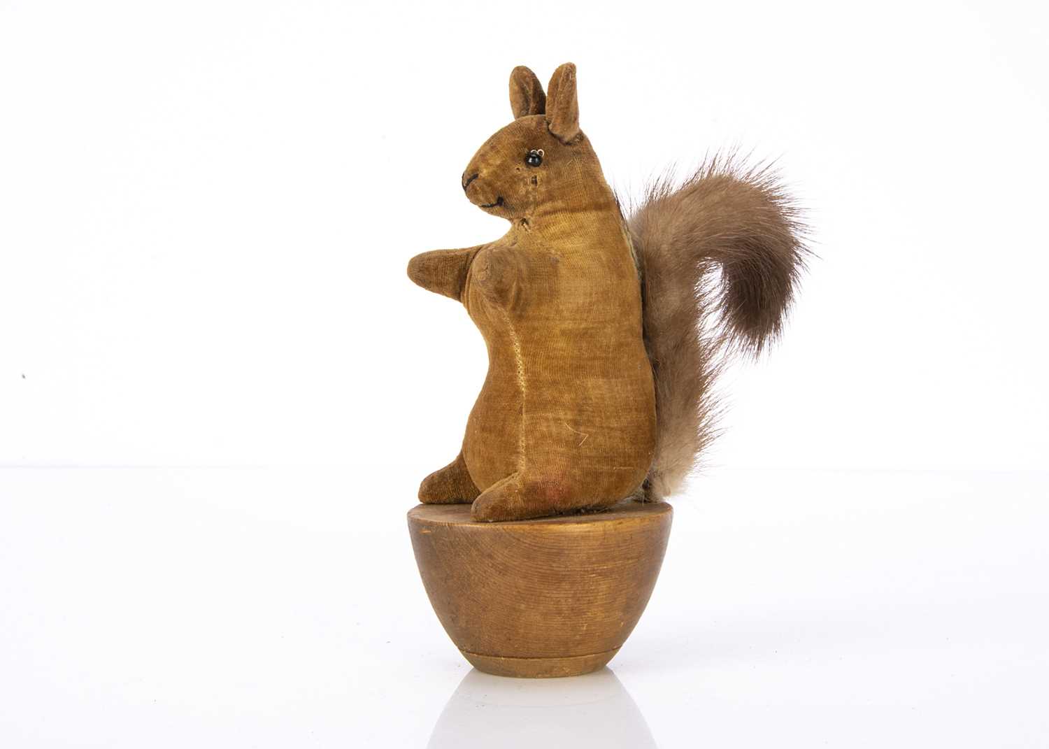 Lot 622 - An early velvet squirrel skittle circa 1910,