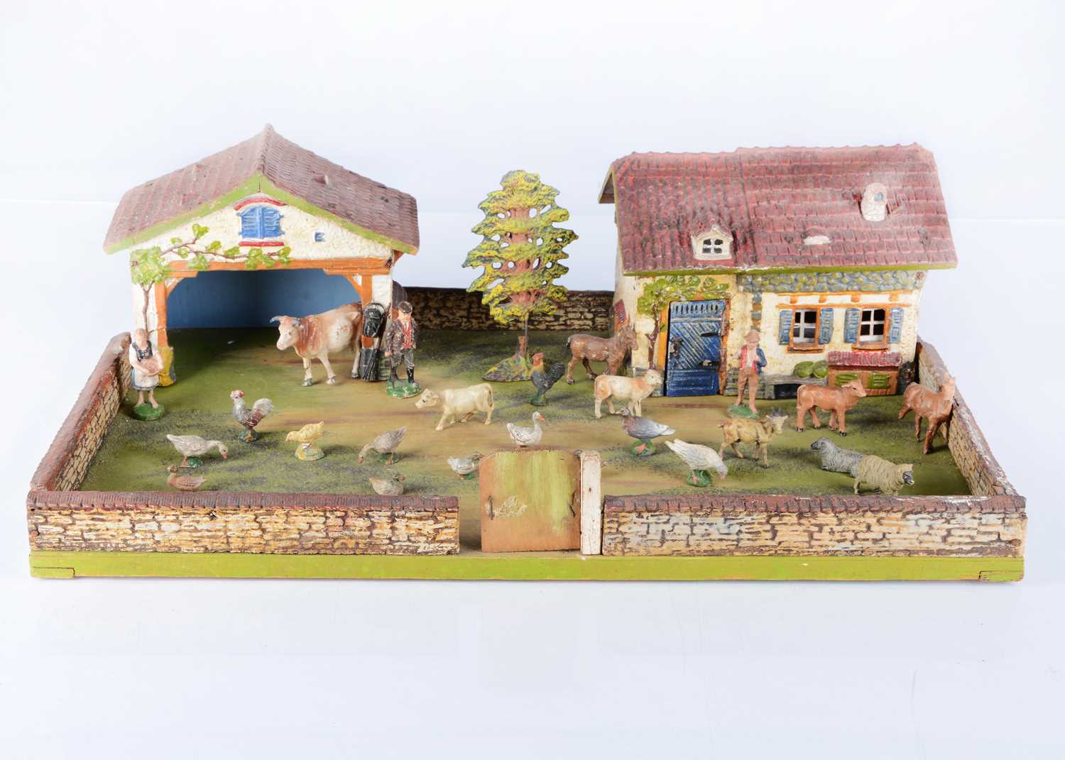 Lot 524 - An Elastolin farm yard with animals,