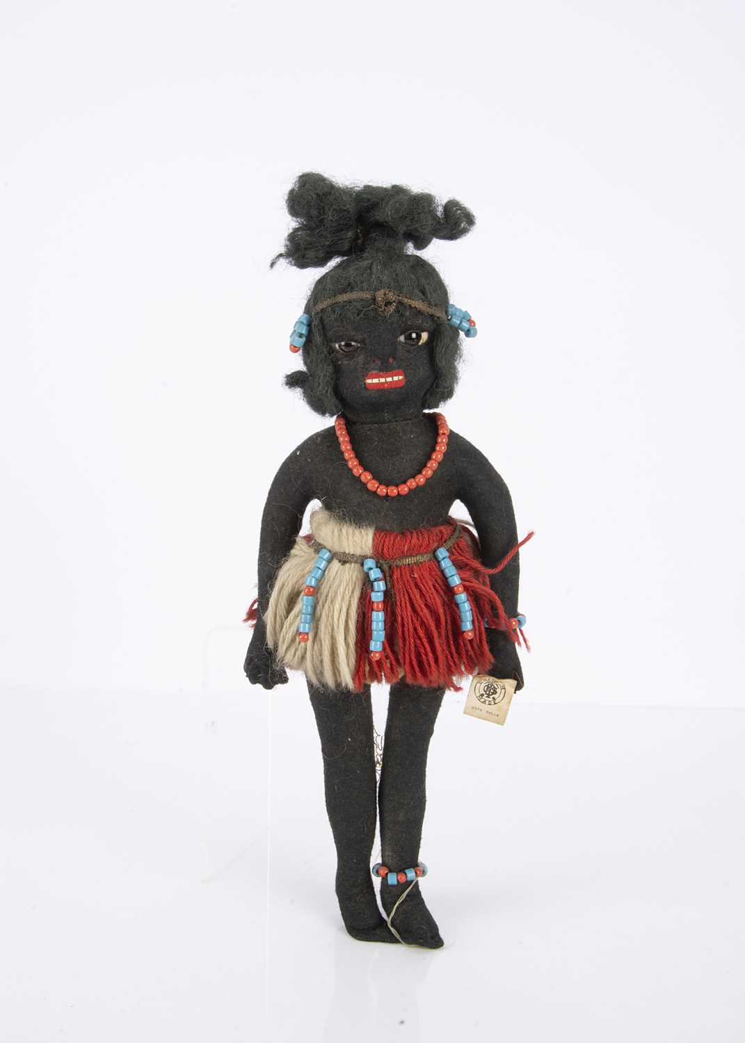 Lot 1330 - A rare Dots Dolls felt black African doll,