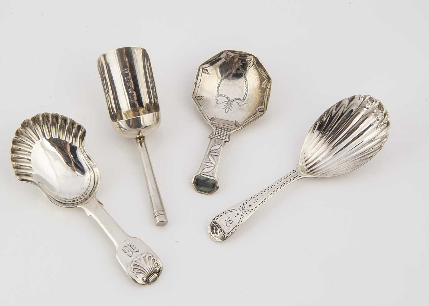 Lot 230 - Four Georgian period silver tea caddy spoons,